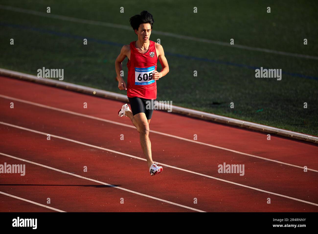 Japanese athletes running on track Stock Photo - Alamy