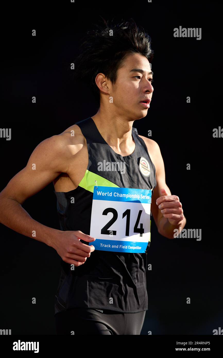 Japanese athletes running on track Stock Photo - Alamy