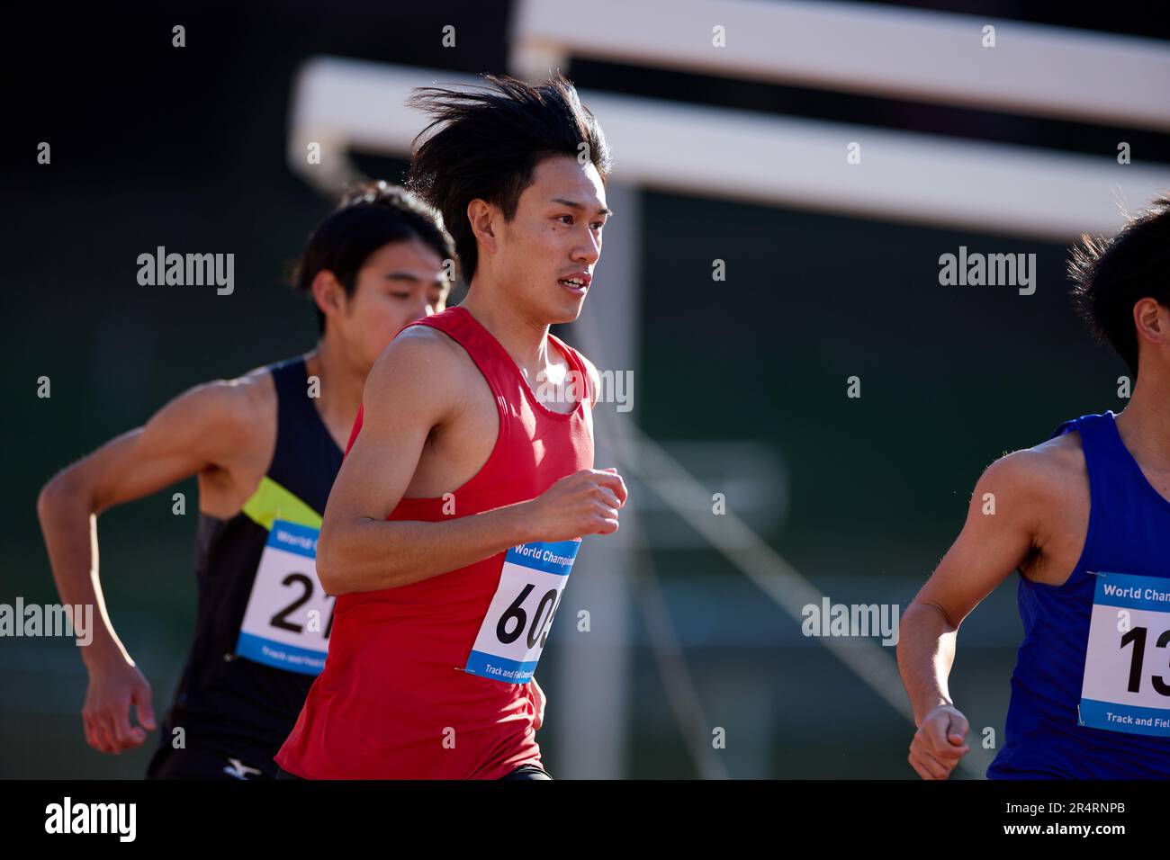 Japanese athletes running on track Stock Photo - Alamy