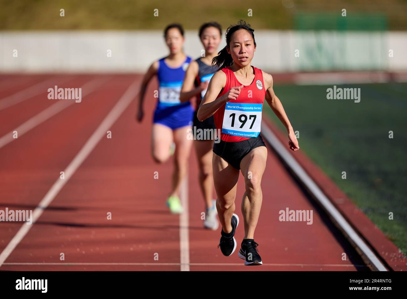 Japanese athletes running on track Stock Photo - Alamy