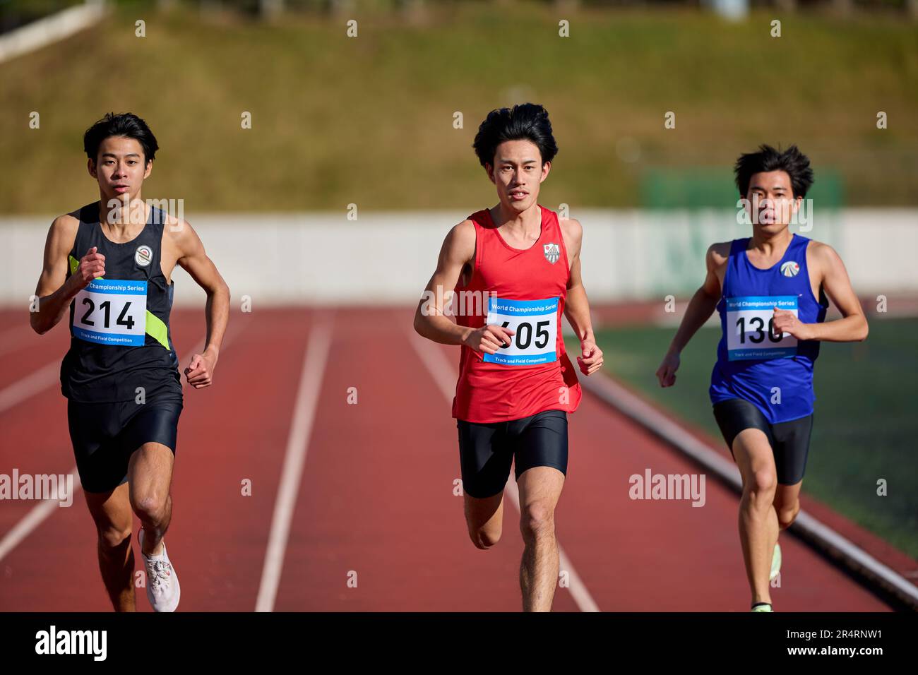 Japanese athletes running on track Stock Photo - Alamy