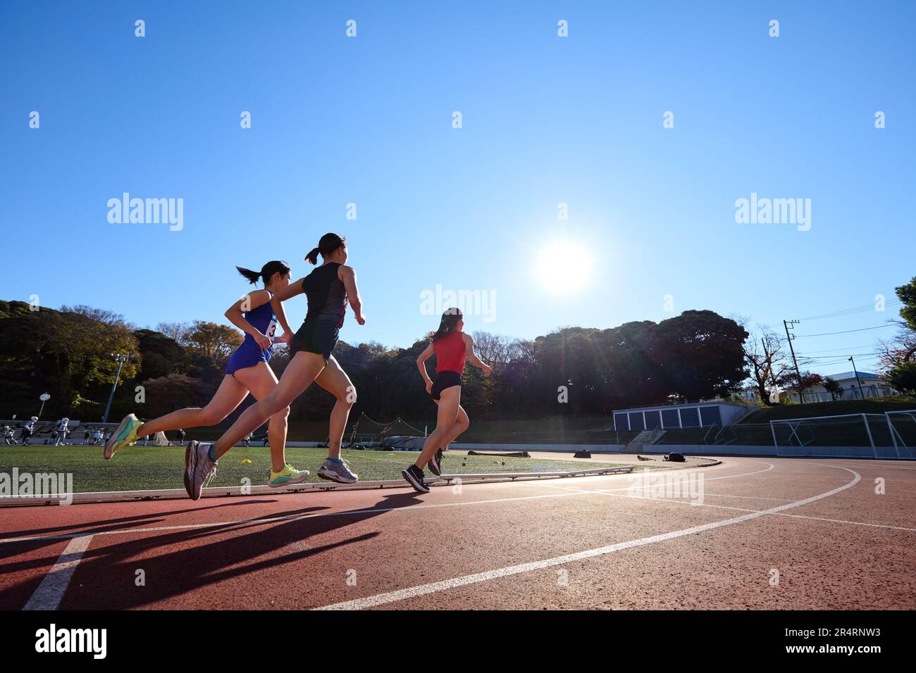 Japanese athletes running on track Stock Photo - Alamy