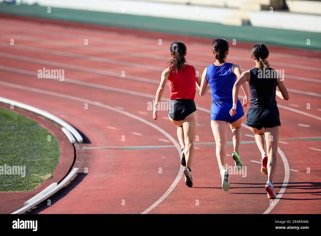 Japanese athletes running on track Stock Photo - Alamy