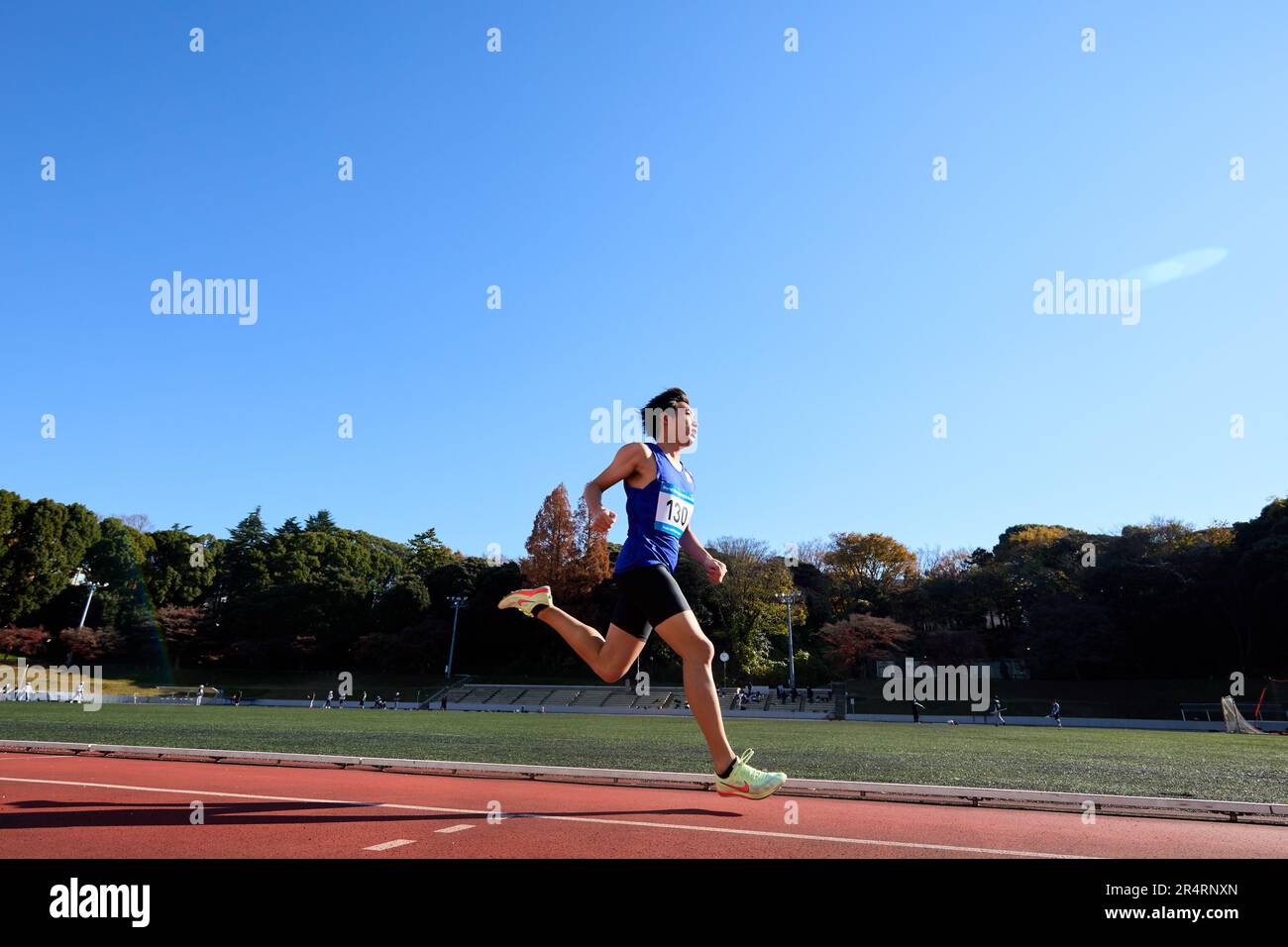 Japanese athletes running on track Stock Photo - Alamy
