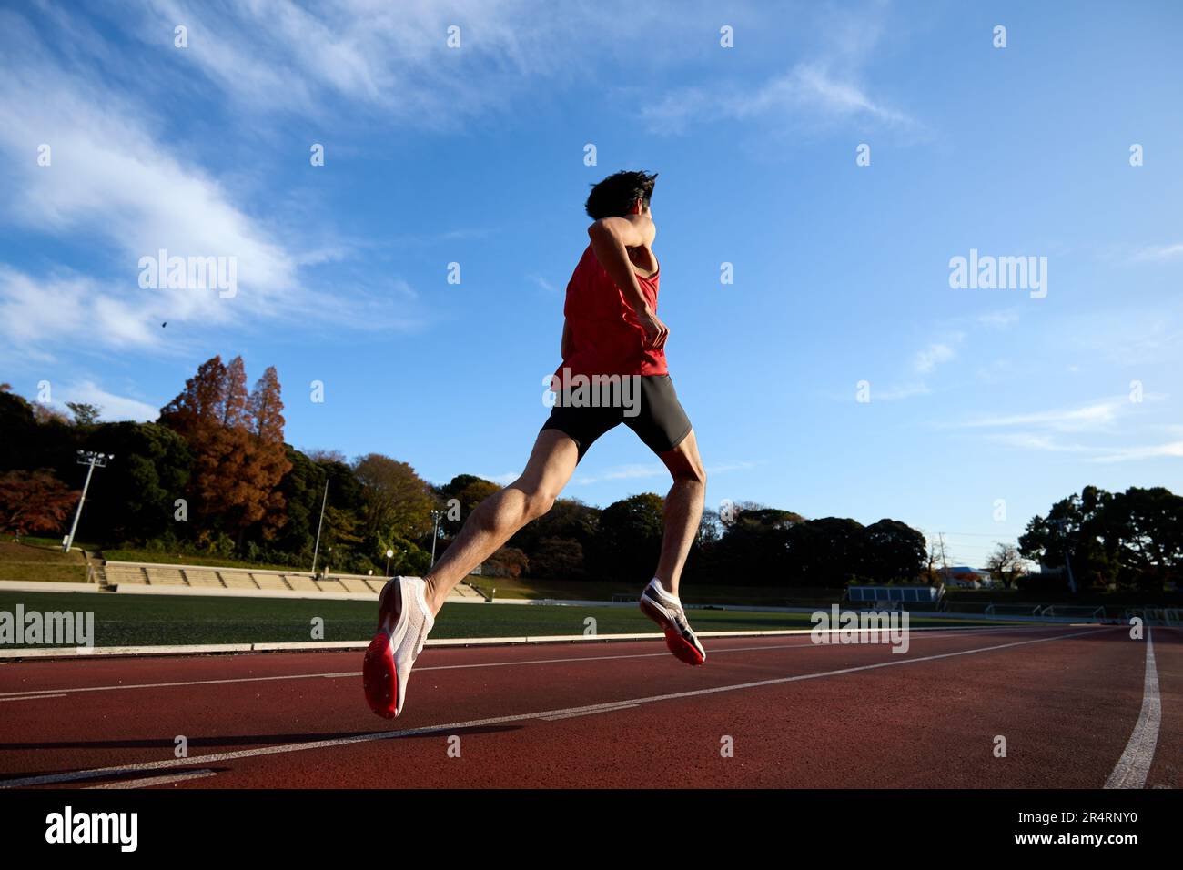 Japanese athletes running on track Stock Photo - Alamy