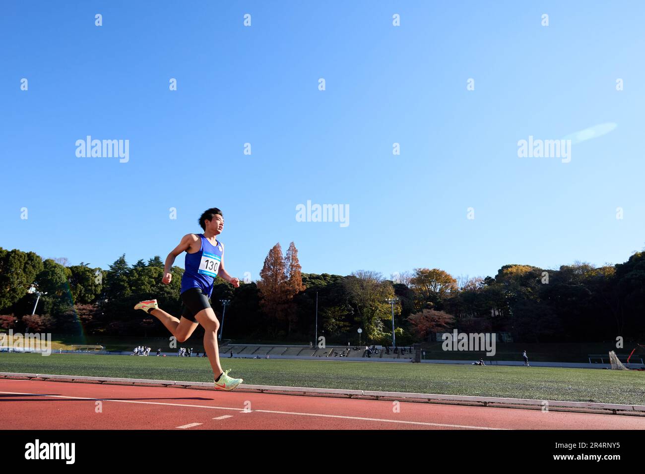 Japanese athletes running on track Stock Photo - Alamy