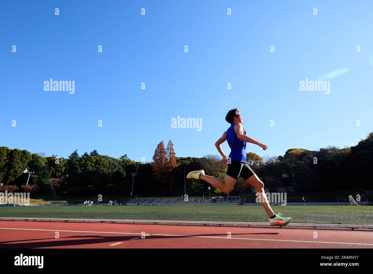 Japanese athletes running on track Stock Photo - Alamy