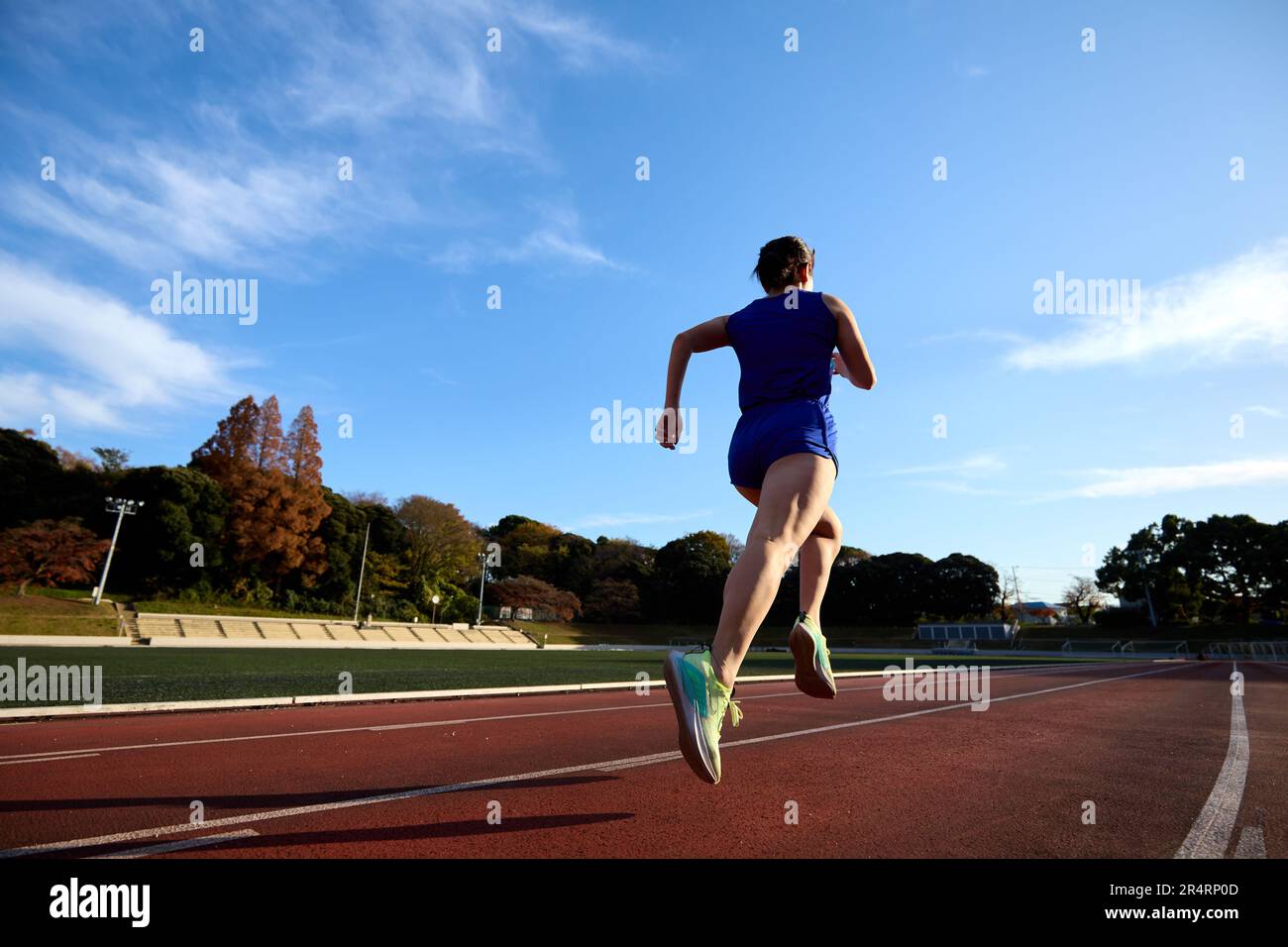 Japanese athletes running on track Stock Photo - Alamy