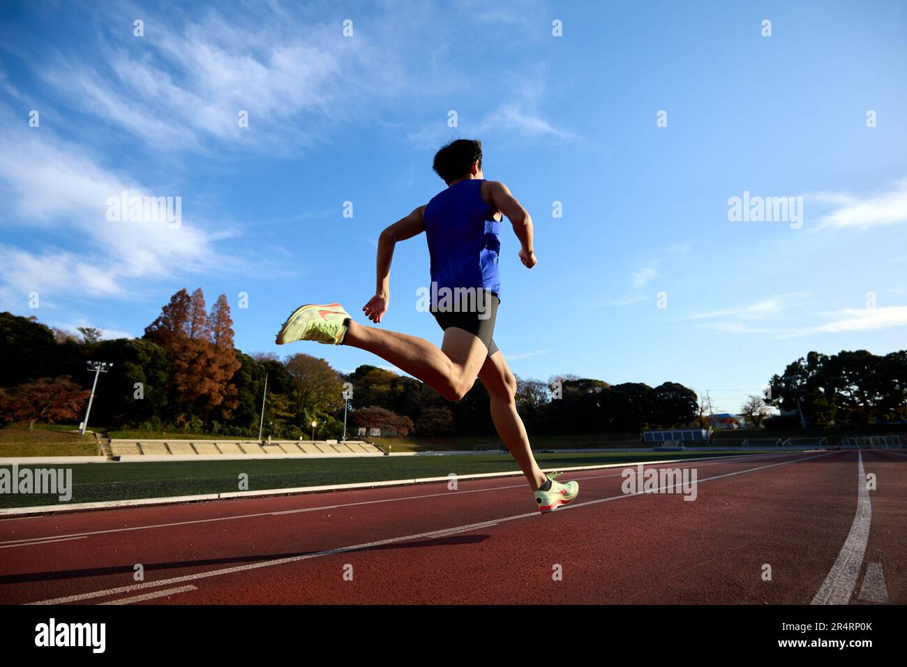 Japanese athletes running on track Stock Photo - Alamy