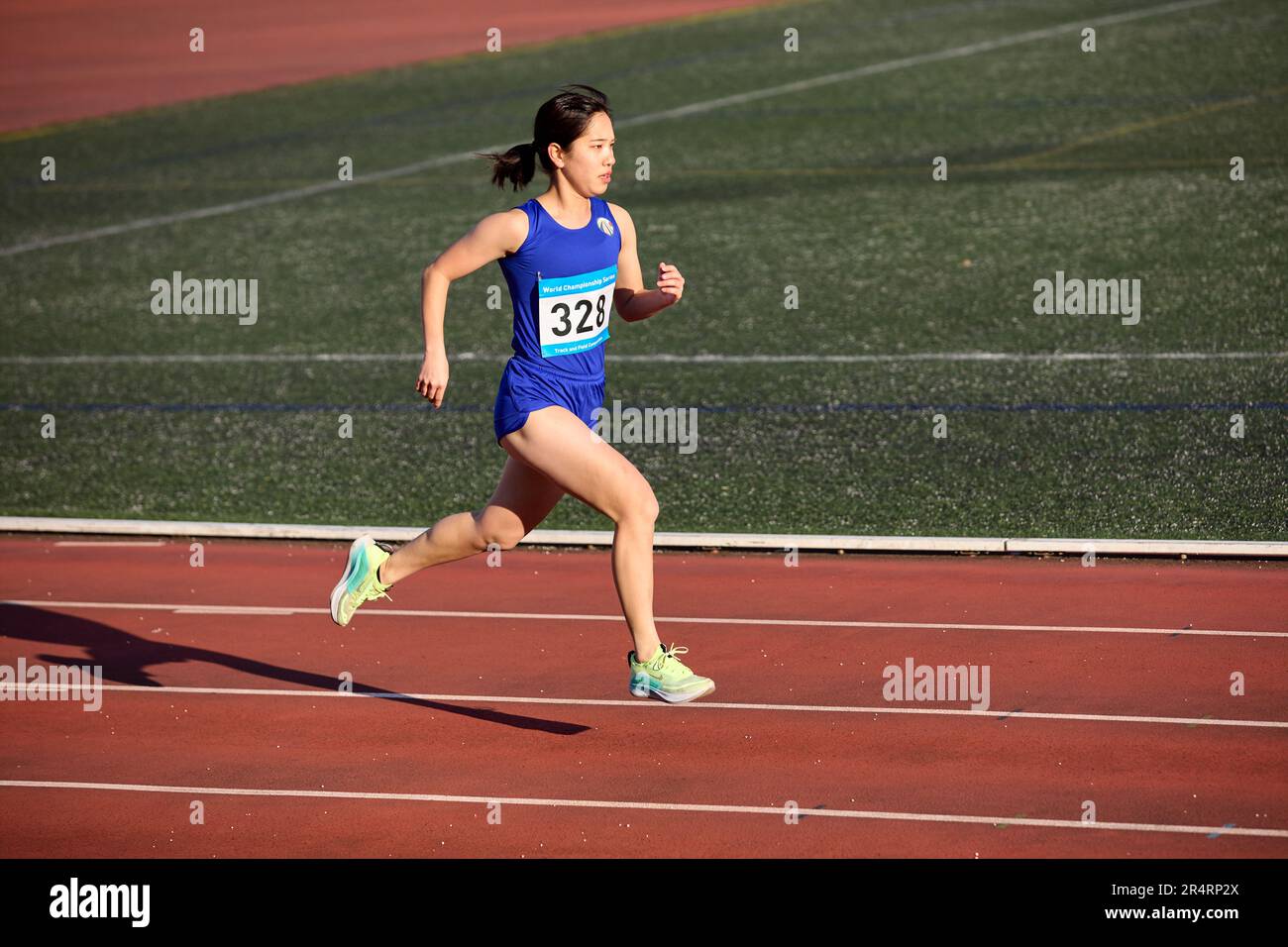 Japanese athletes running on track Stock Photo - Alamy