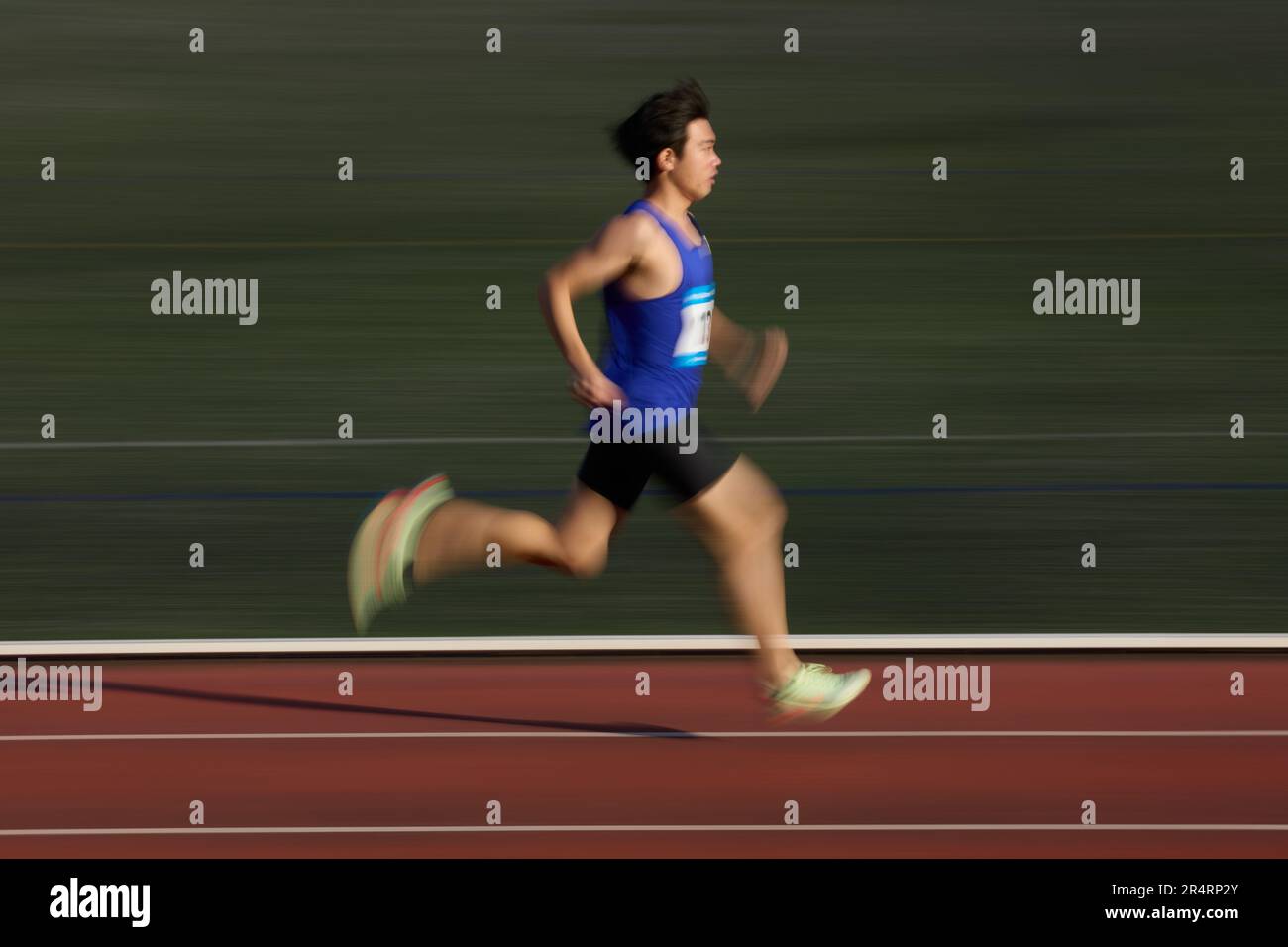 Japanese athletes running on track Stock Photo - Alamy