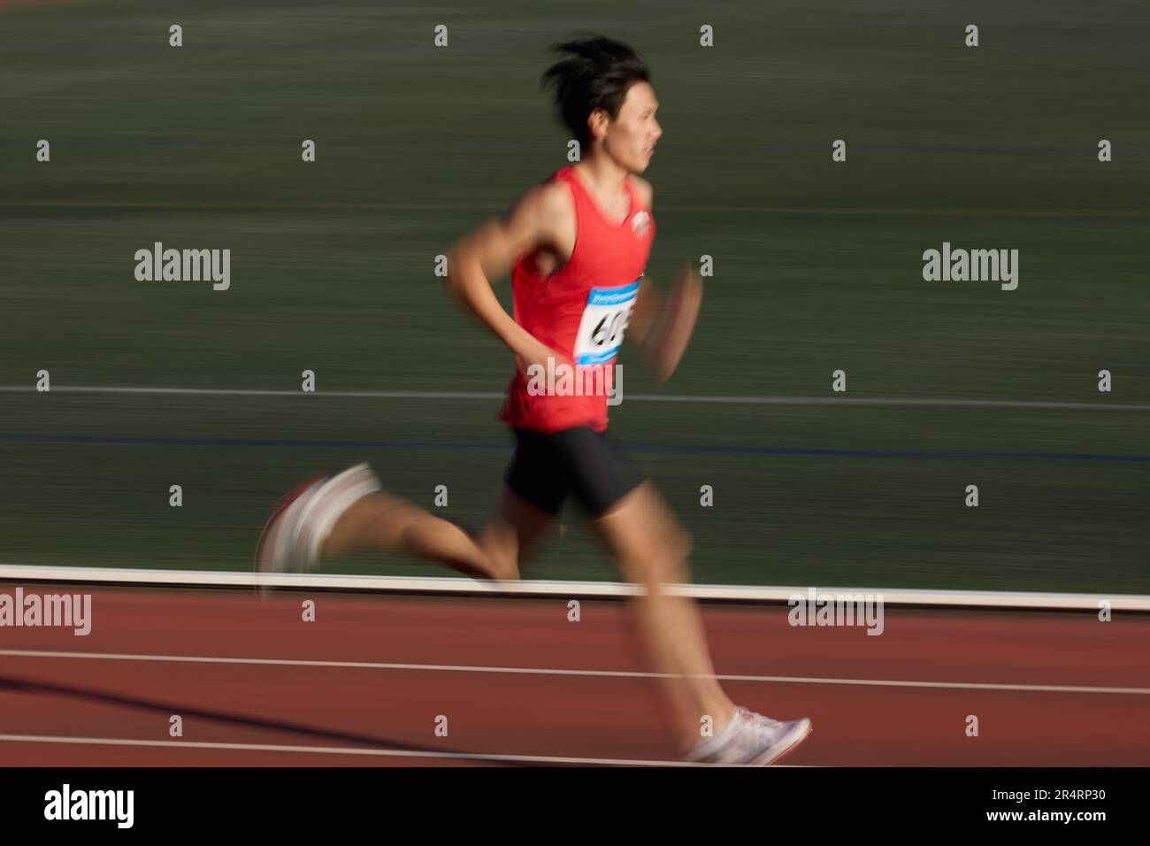 Japanese athletes running on track Stock Photo - Alamy