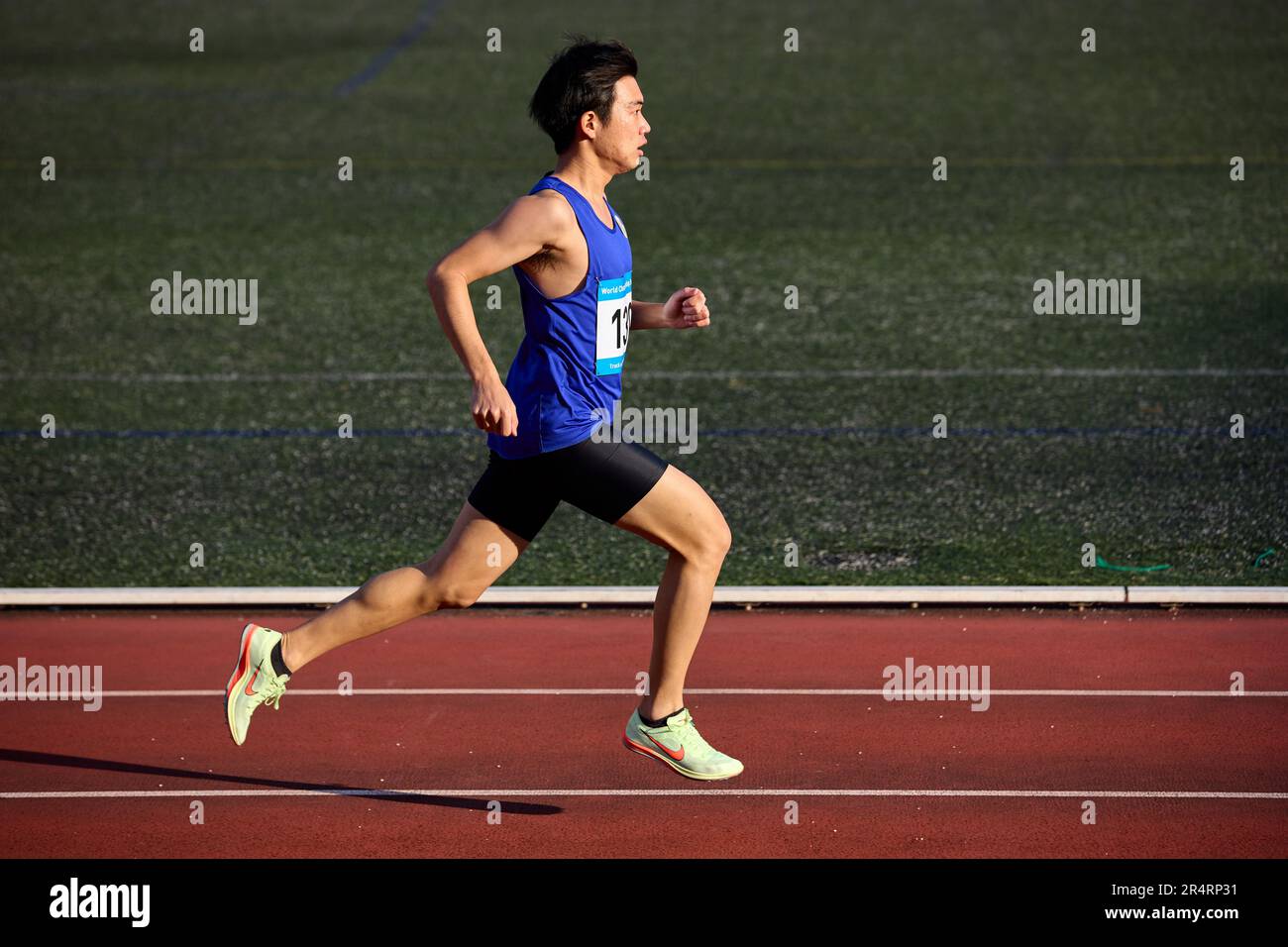 Japanese athletes running on track Stock Photo - Alamy