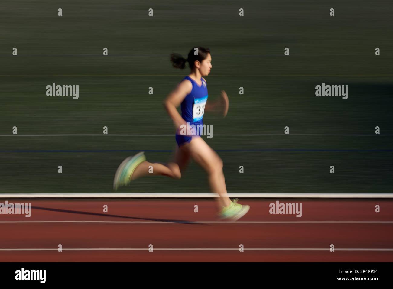 Japanese athletes running on track Stock Photo - Alamy