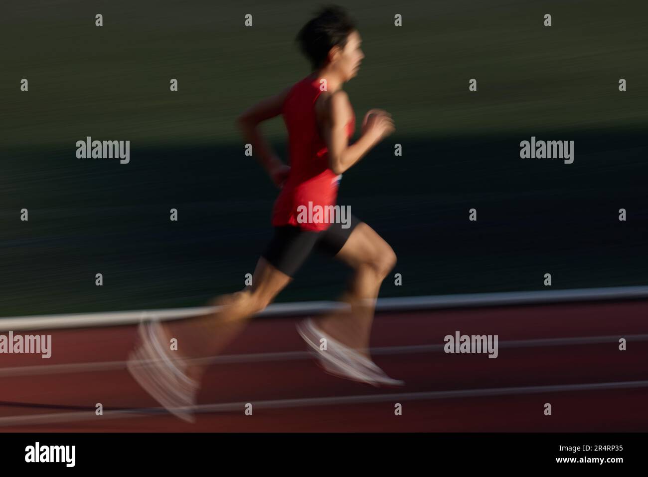 Japanese athletes running on track Stock Photo - Alamy