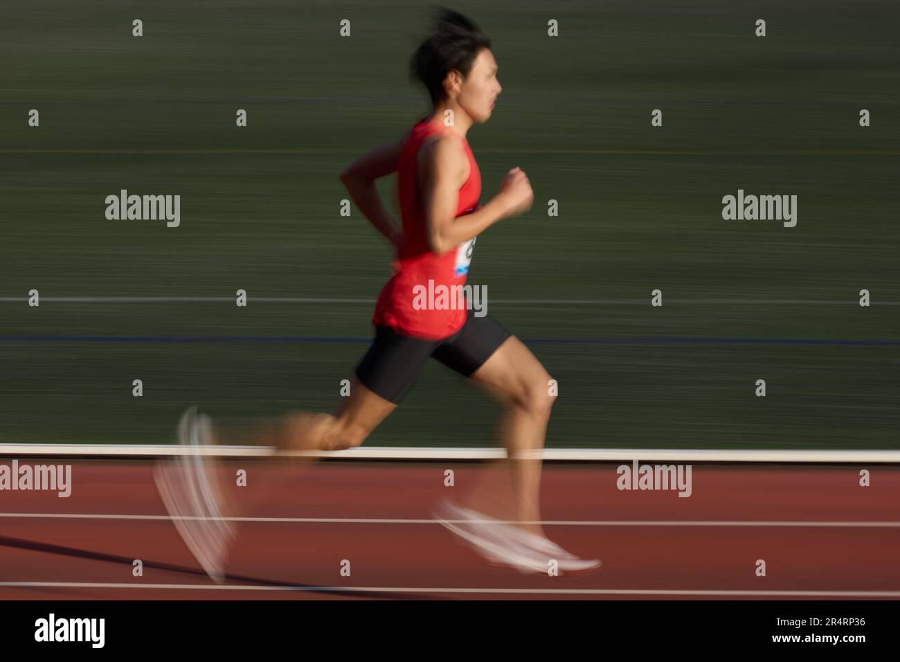 Japanese athletes running on track Stock Photo - Alamy