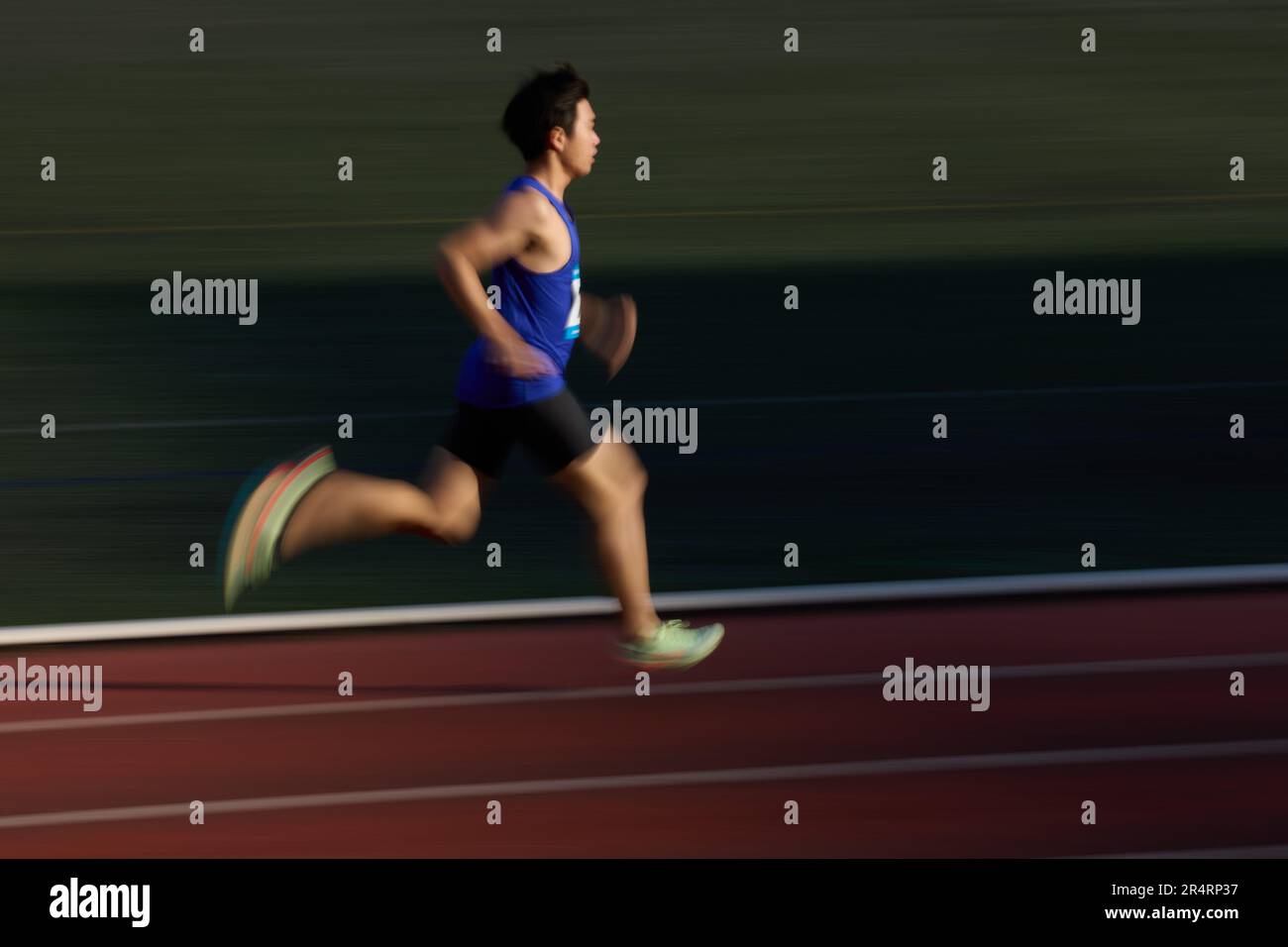 Japanese athletes running on track Stock Photo - Alamy