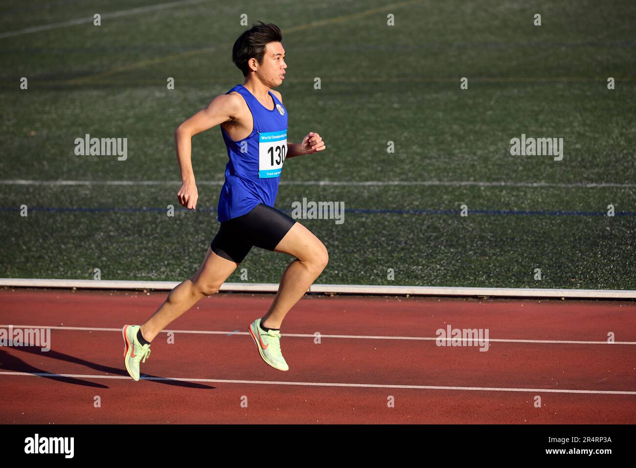Japanese athletes running on track Stock Photo - Alamy