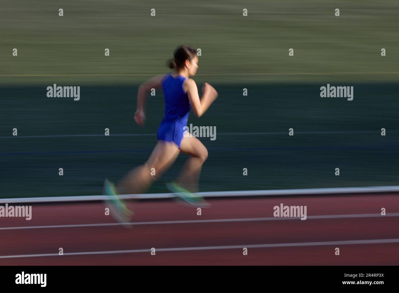 Japanese athletes running on track Stock Photo - Alamy