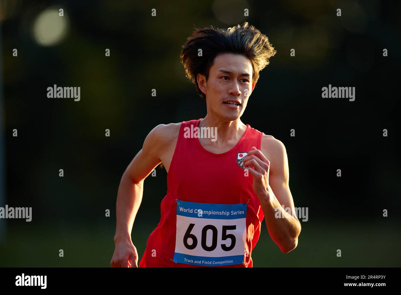 Japanese athletes running on track Stock Photo - Alamy