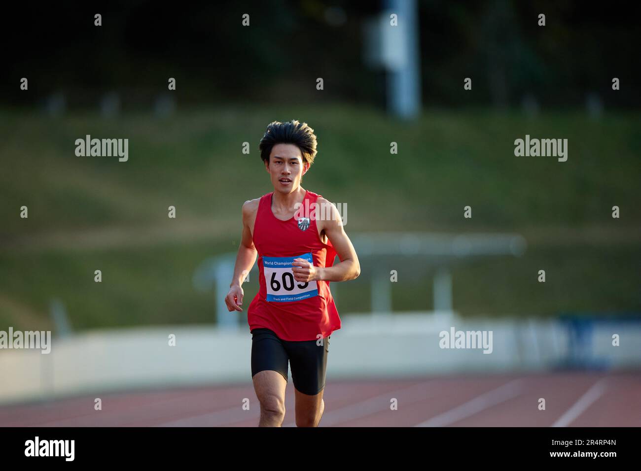 Japanese athletes running on track Stock Photo - Alamy