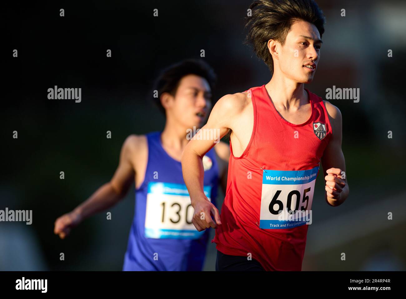 Japanese athletes running on track Stock Photo - Alamy