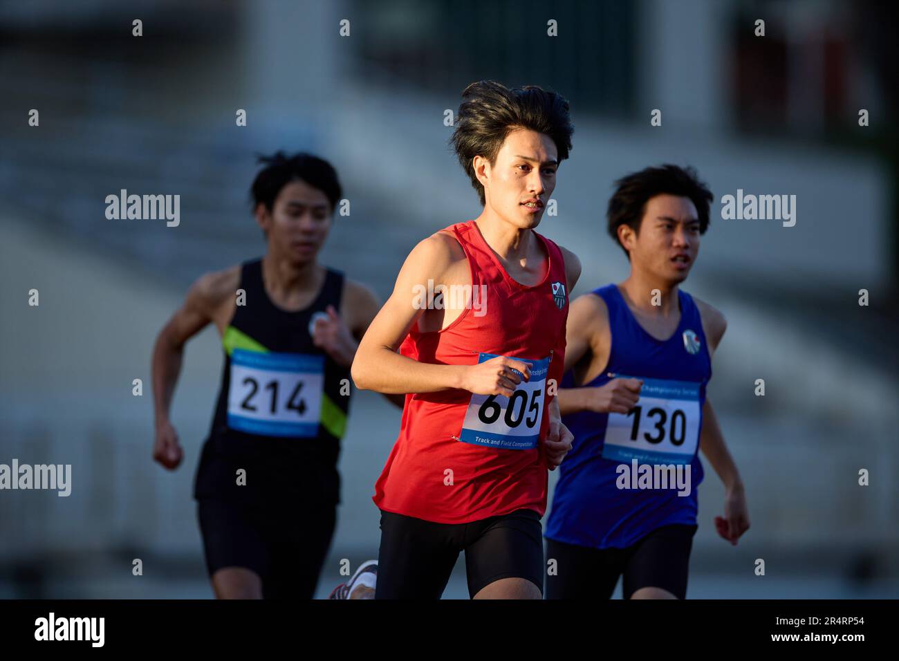 Japanese athletes running on track Stock Photo - Alamy