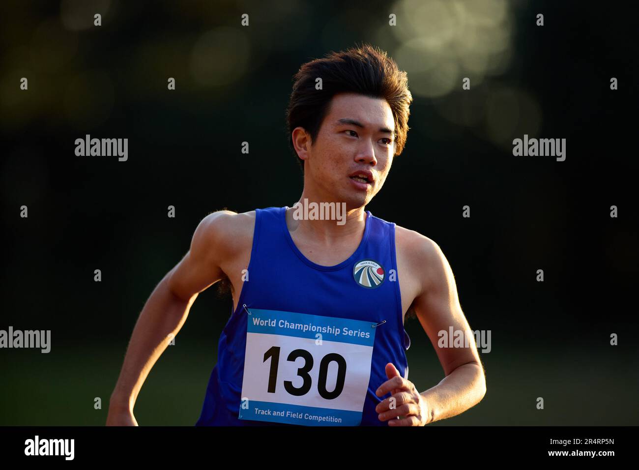 Japanese athletes running on track Stock Photo - Alamy