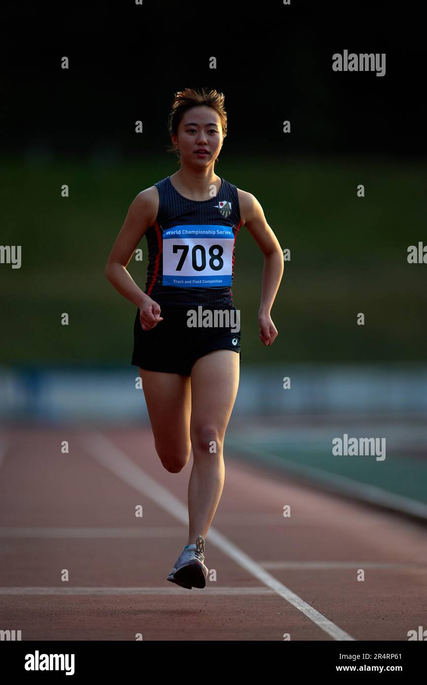 Japanese athletes running on track Stock Photo - Alamy