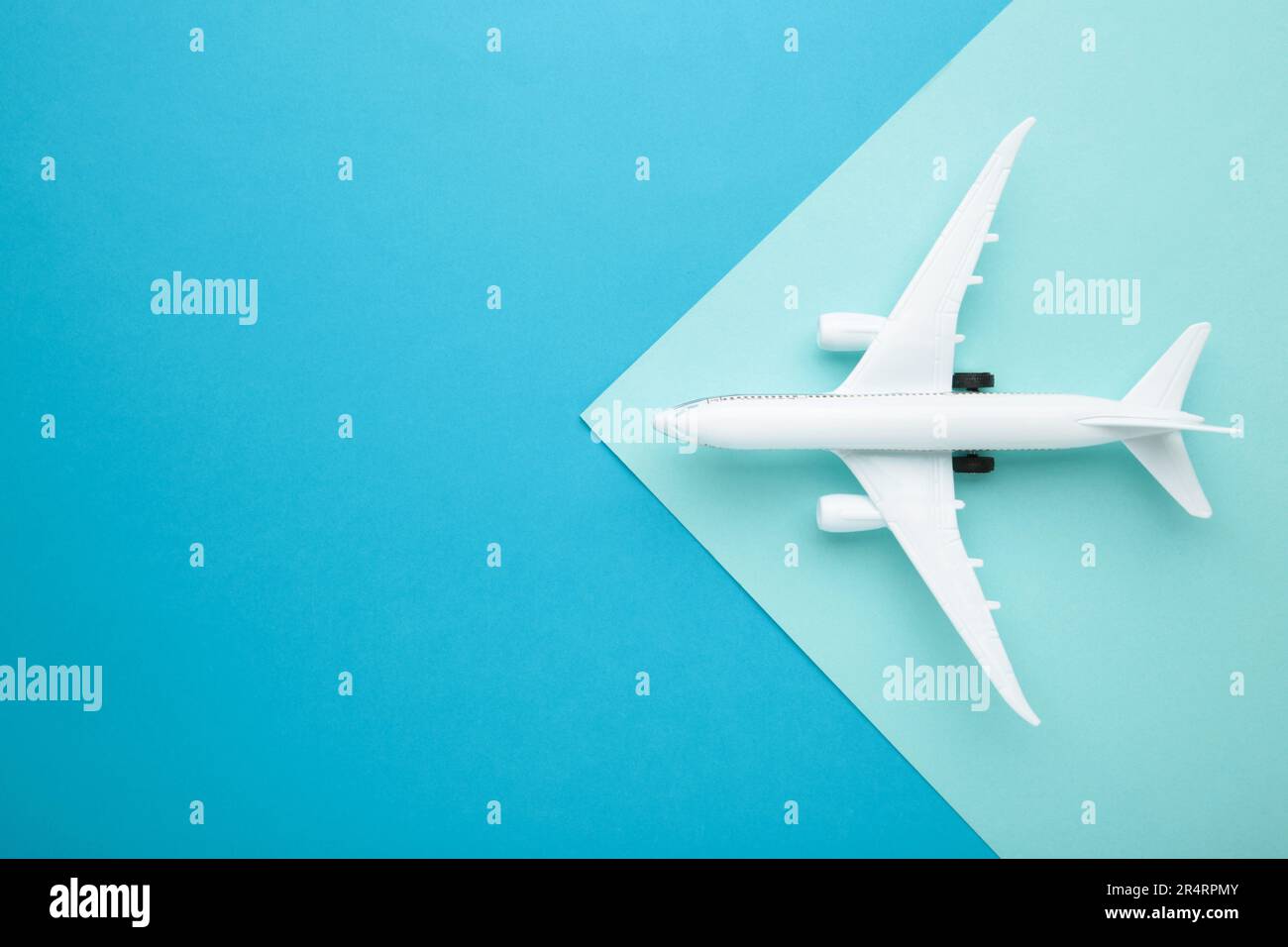 Model airplane on blue pastel color background. Travel concept Stock ...