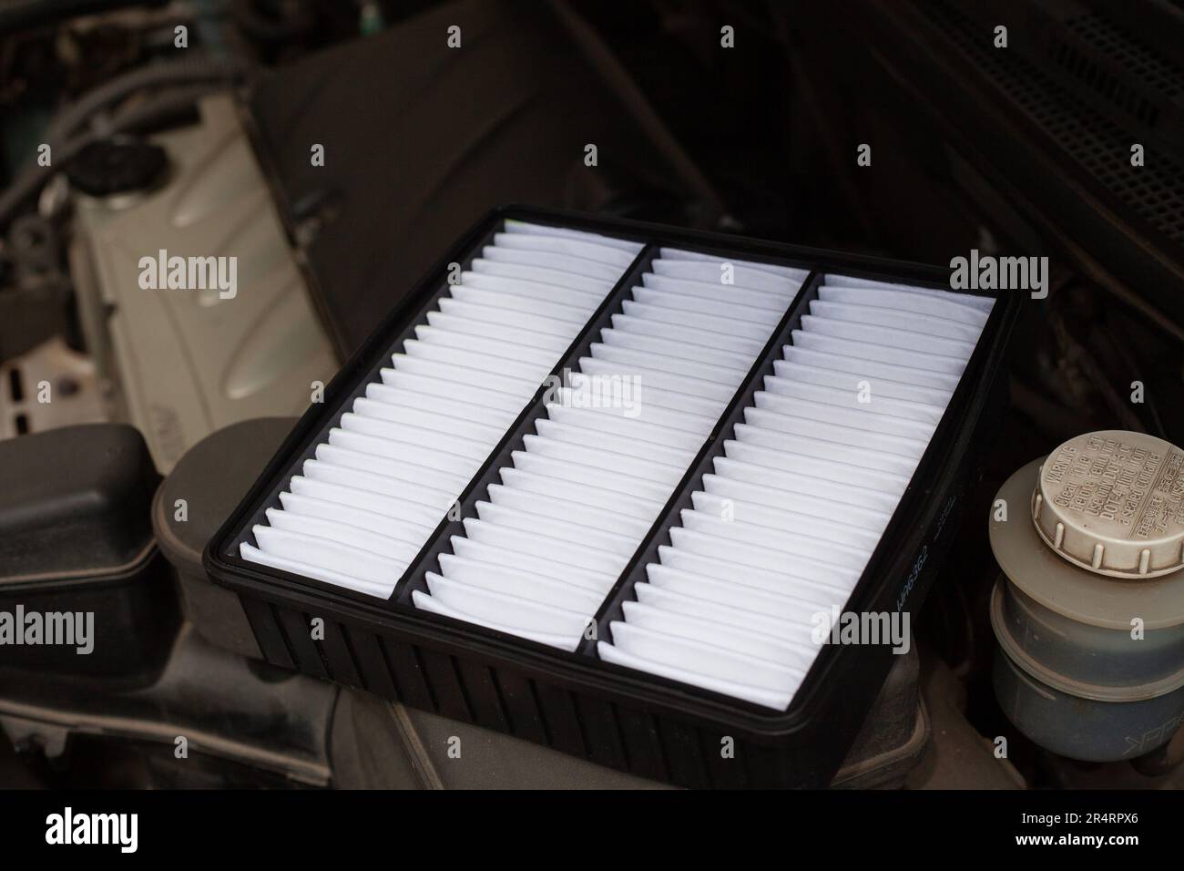 New air filter. Replacement engine air flow filter Stock Photo - Alamy