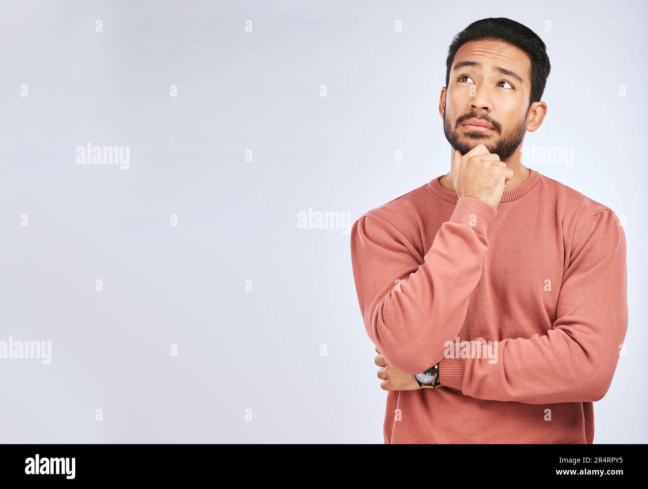 Man, thinking and idea mockup in studio or planning, decision and ...