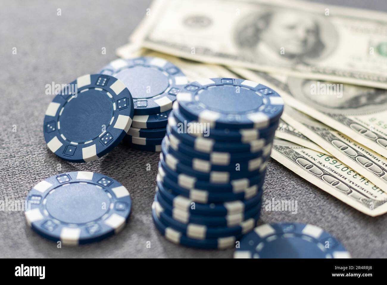 Small Stack of Blue Poker Chips, closeup on background Stock Photo - Alamy
