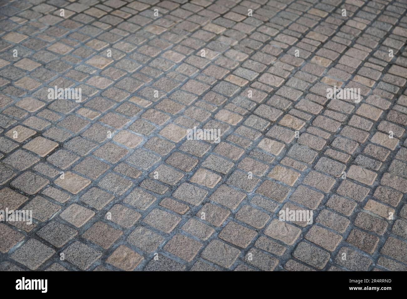 Cobblestone pavement texture background Stock Photo - Alamy
