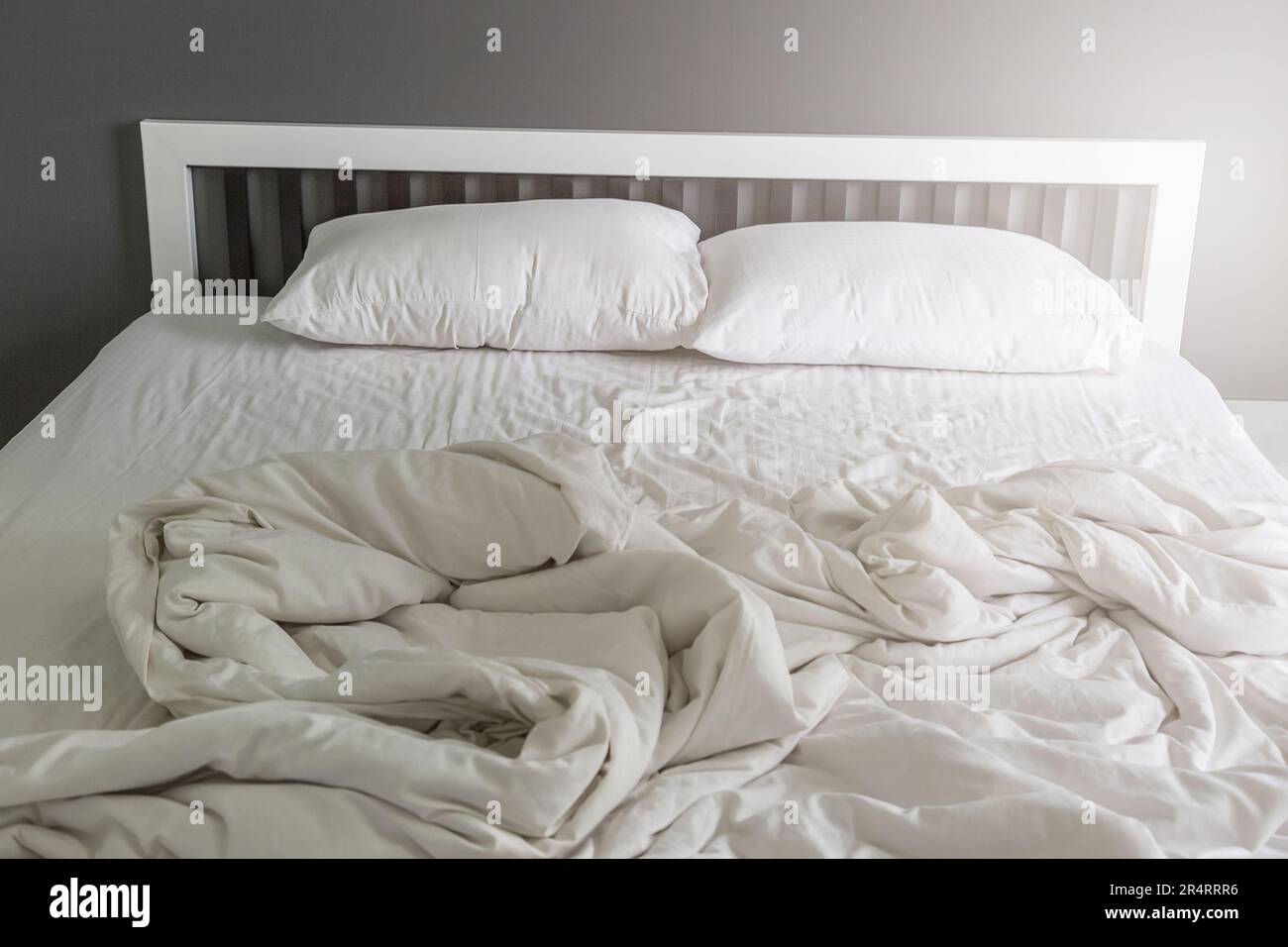 Messy white sheet on bed hi-res stock photography and images - Alamy