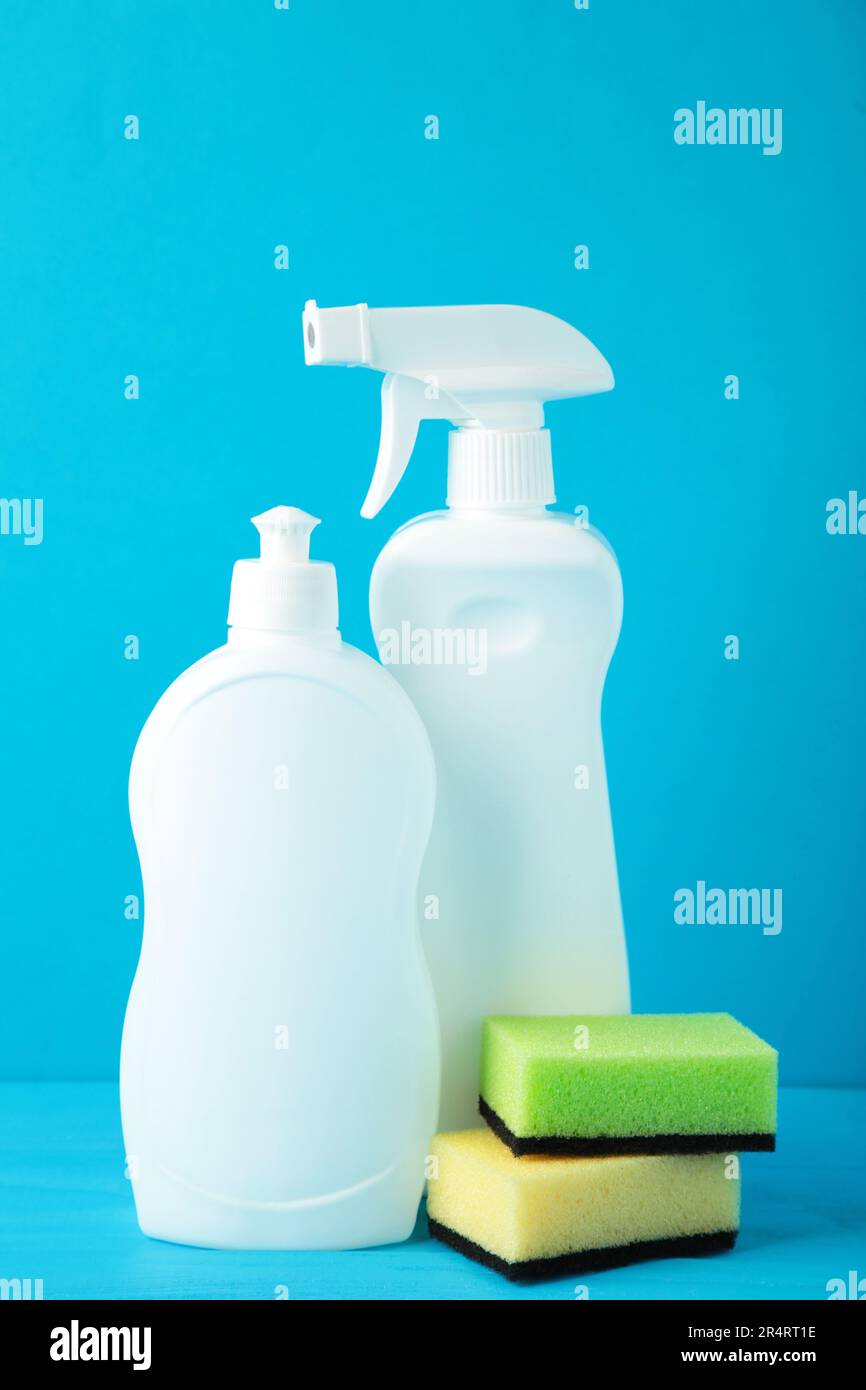 Set of cleaning tools on a blue background. Top view Stock Photo - Alamy