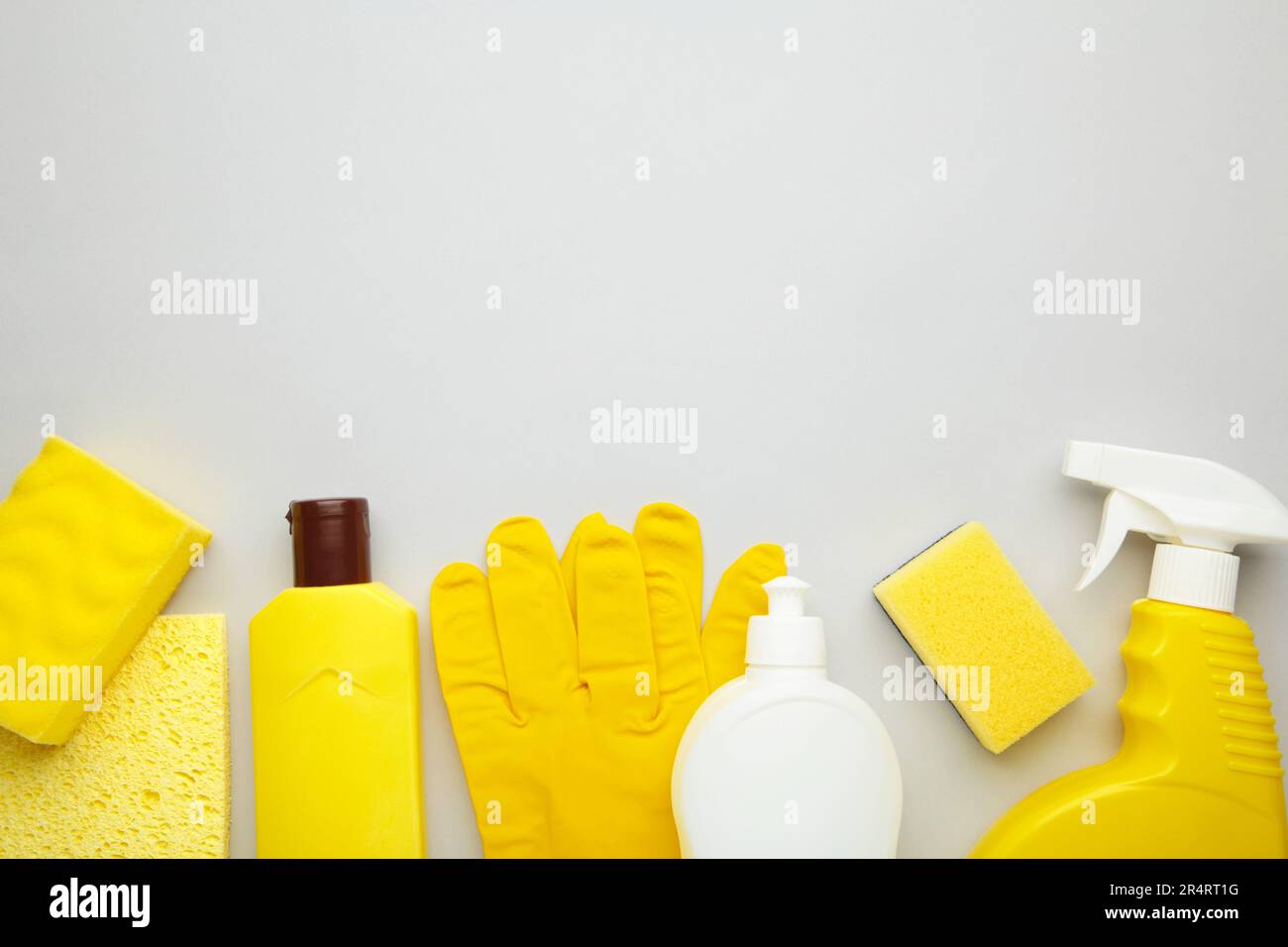 Cleaning Set. Yellow and white tools for cleaning. Cleaning agents ...