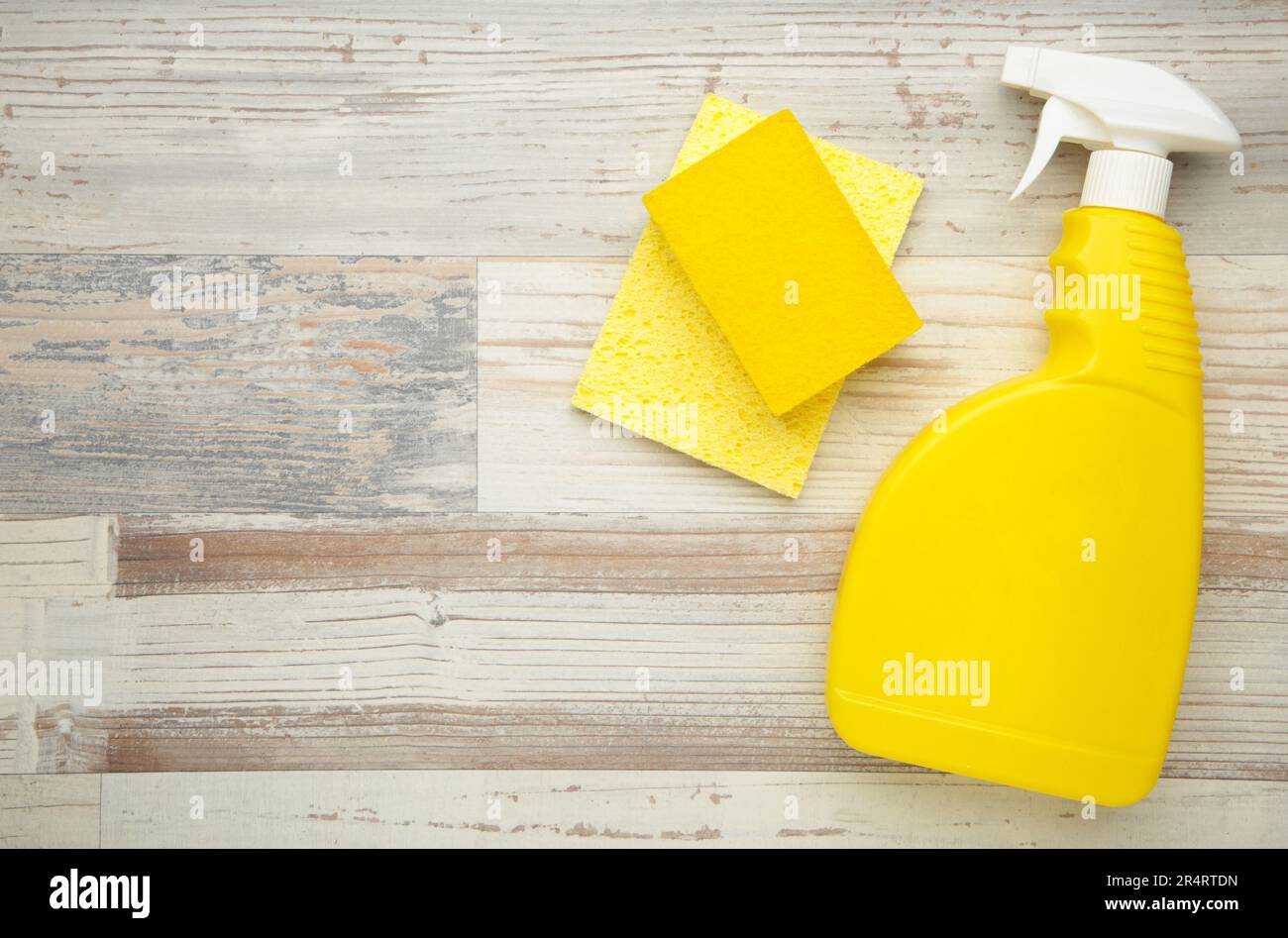 Cleaning Set. Yellow tools for cleaning. Cleaning spray with sponge on ...