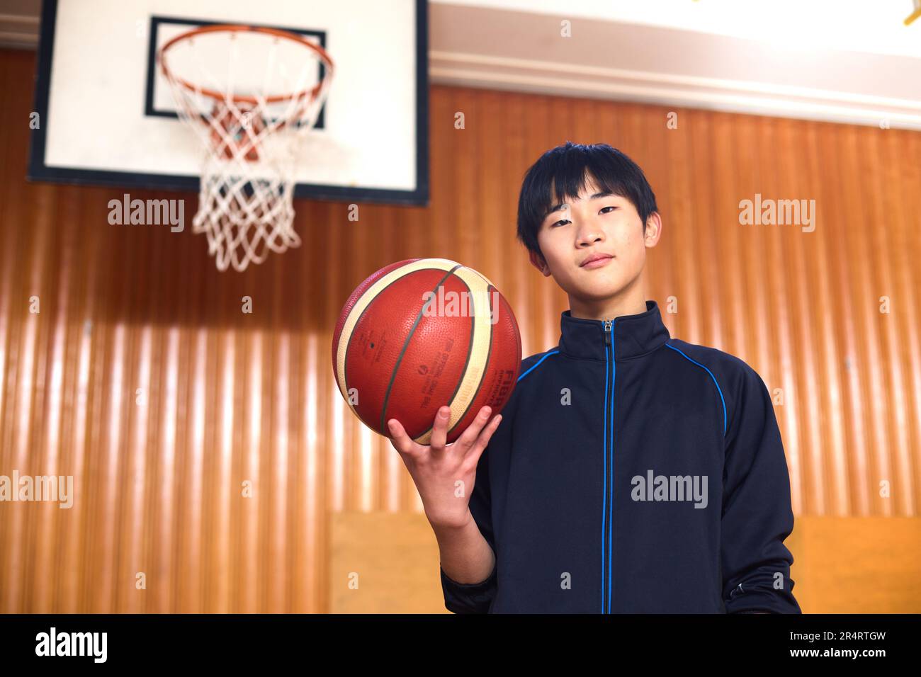 Japanese school kid playing basketball Stock Photo - Alamy
