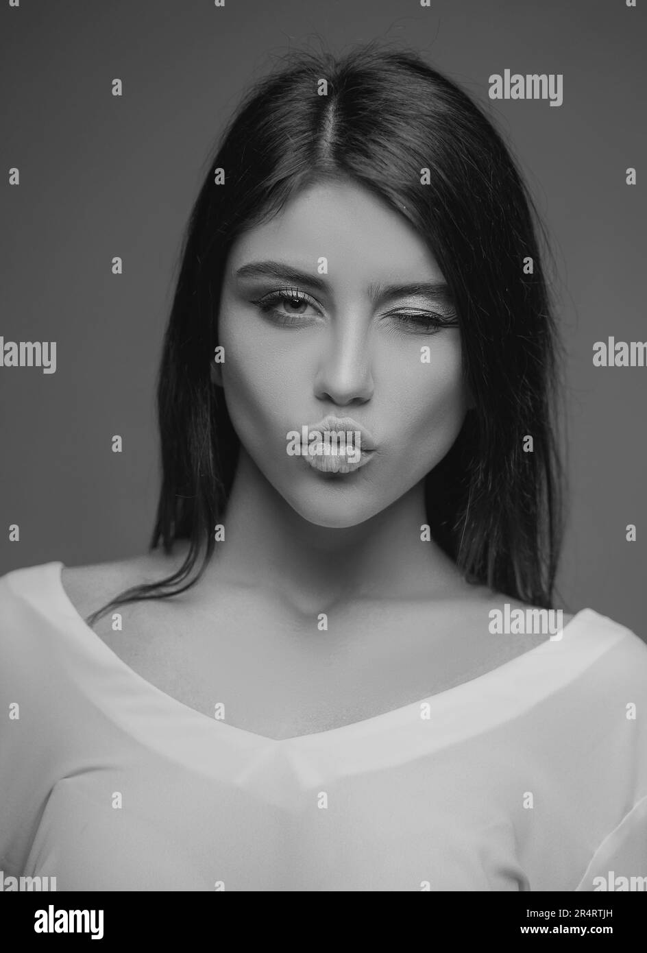 People emotions. Happy teen woman winking and kiss. Cute girl face ...