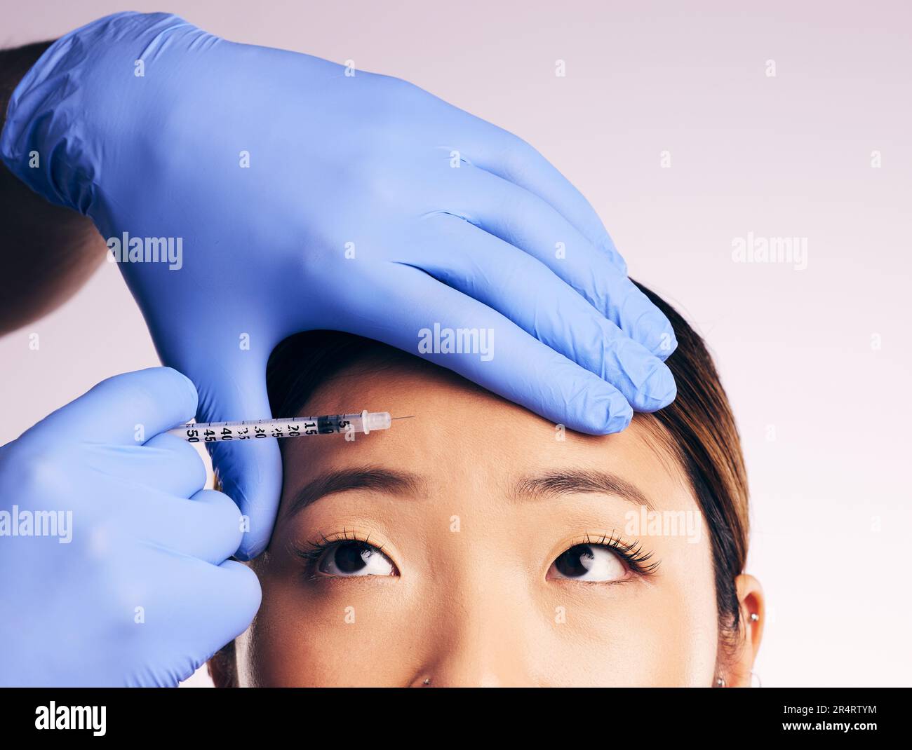 Face skincare, forehead injection and Asian woman in studio isolated on ...