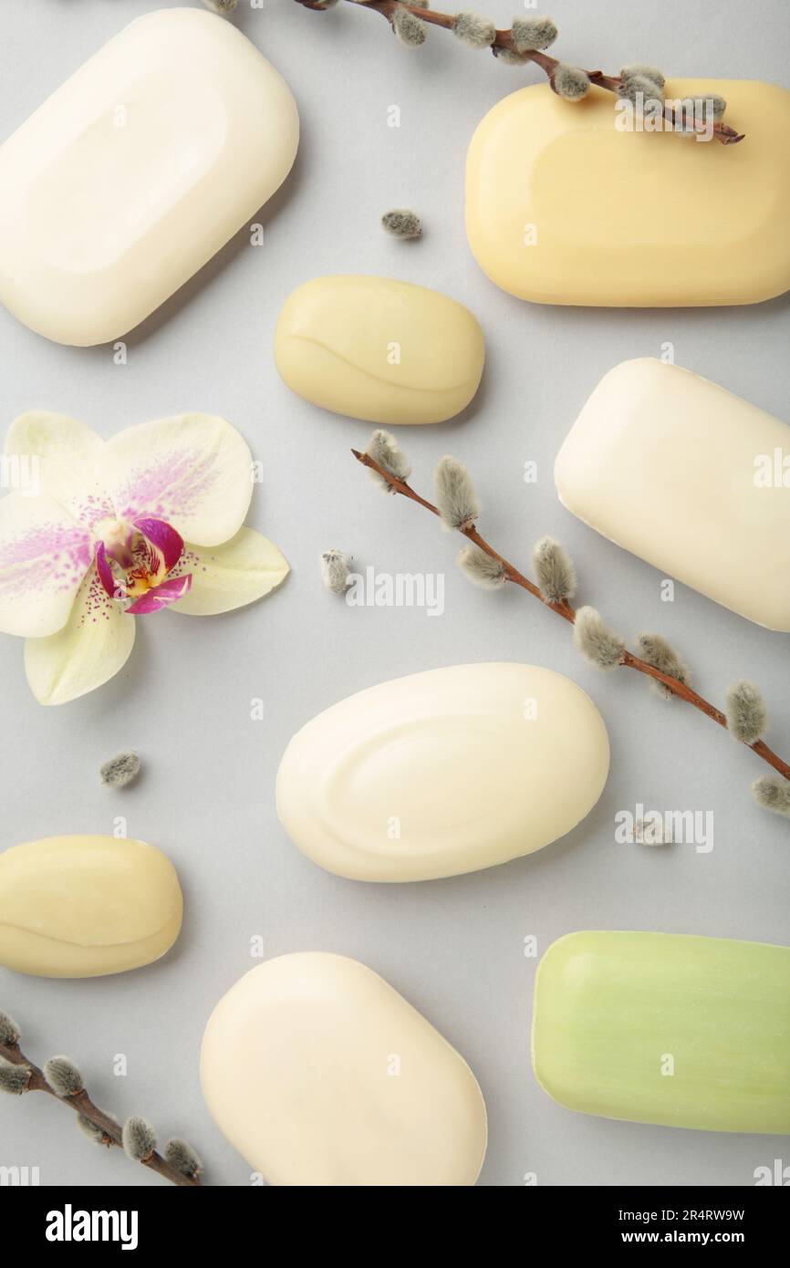 Different white soaps with flowers. A lot of solid soap for hygiene and ...