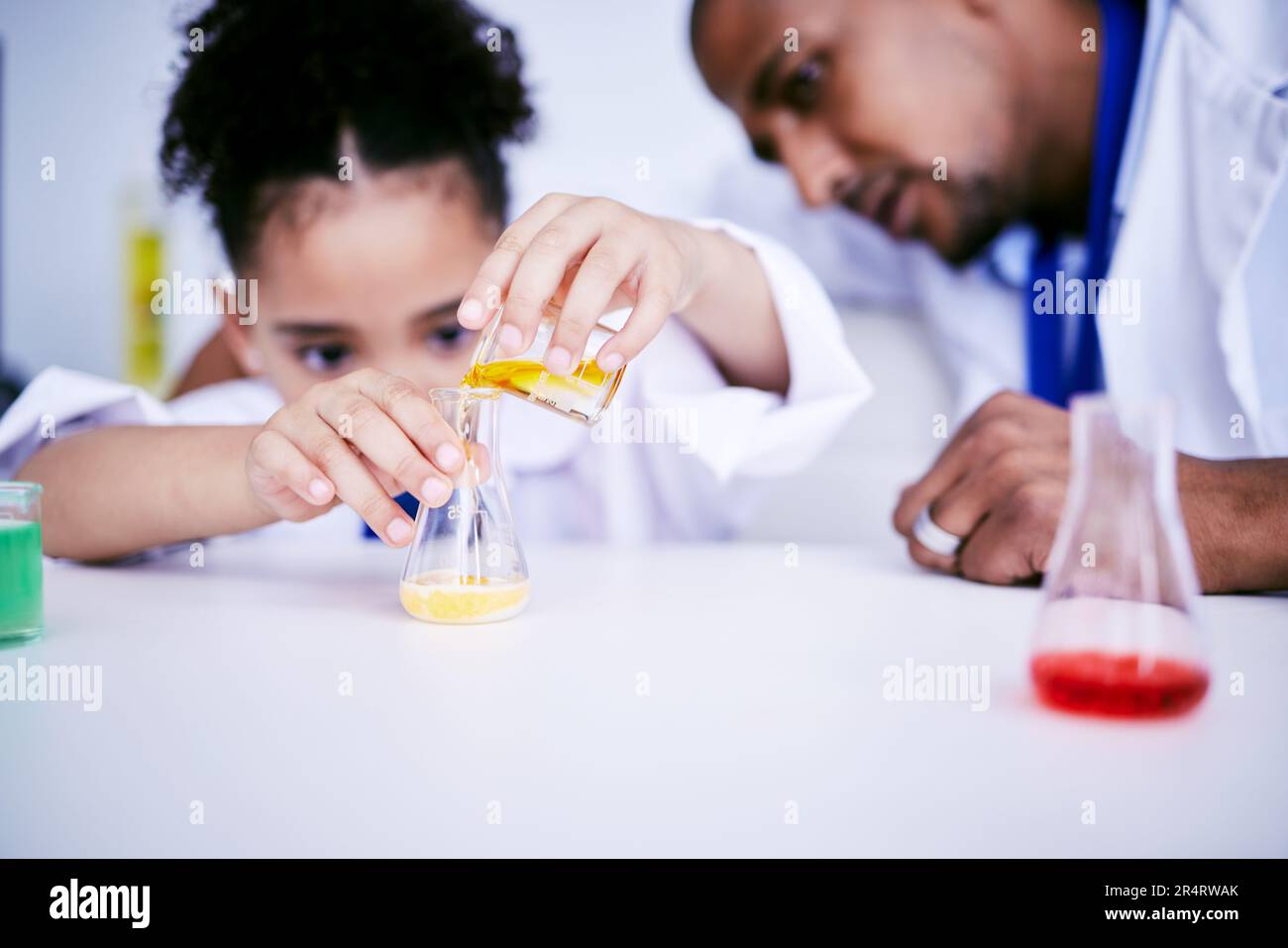 Science, experiment and child doing a project in a lab in physics or ...