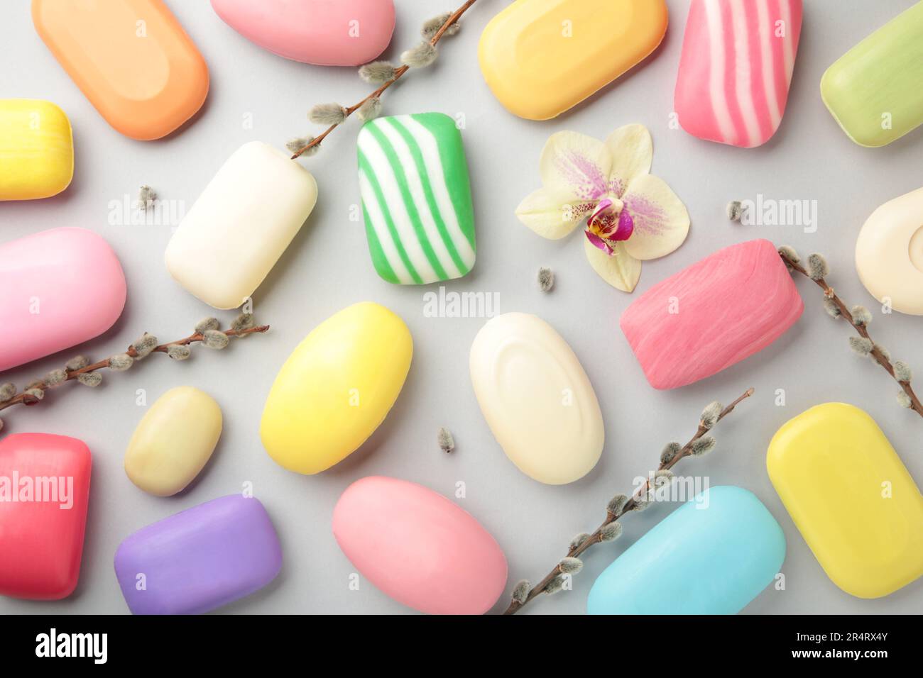 Different white soaps with flowers. A lot of solid soap for hygiene and ...