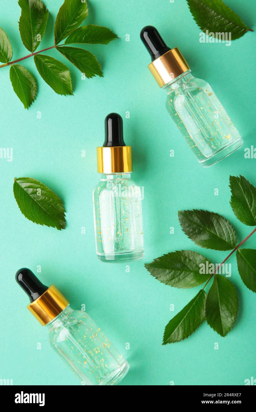 Natural skincare bottles container and organic green leaf , flowers ...