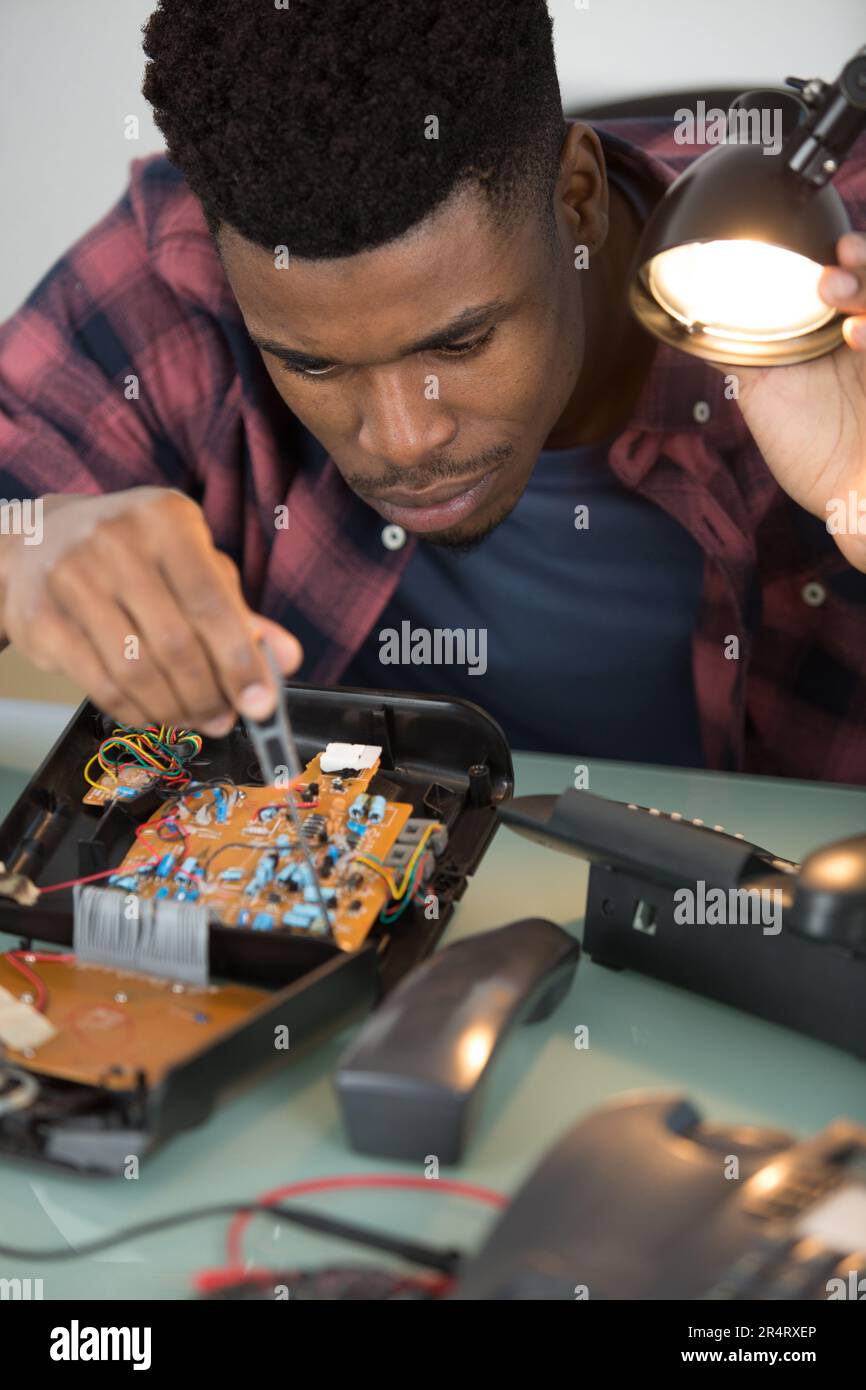 technician assembling inside of phone Stock Photo - Alamy