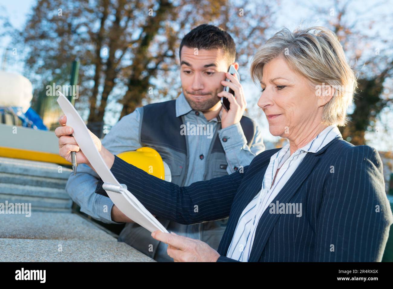 an engineer and architect outdoors Stock Photo - Alamy