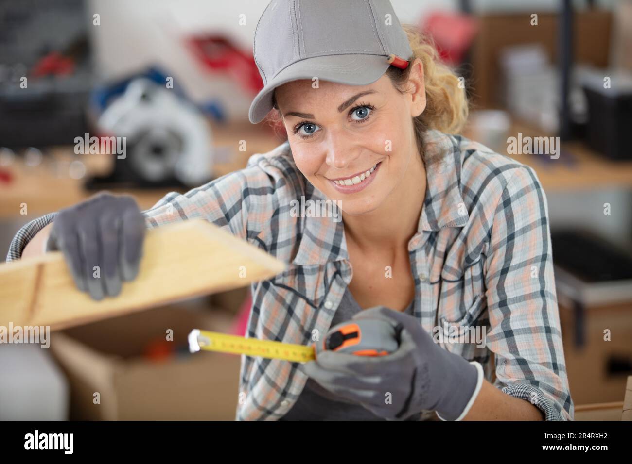 female carpenter at work in warehouse Stock Photo - Alamy