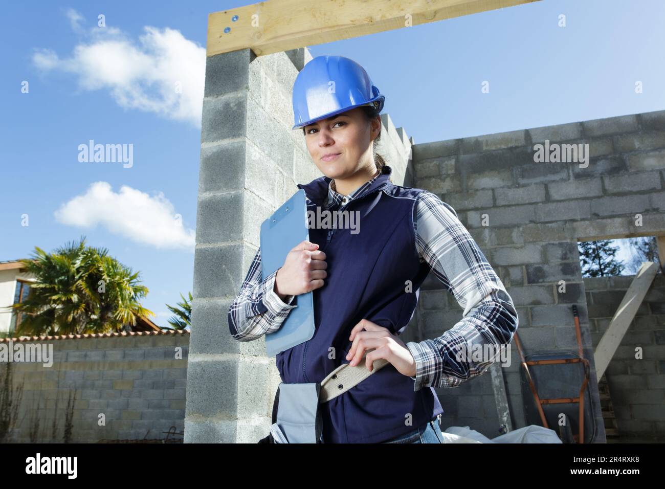 portrait of female construction worker on building site Stock Photo - Alamy