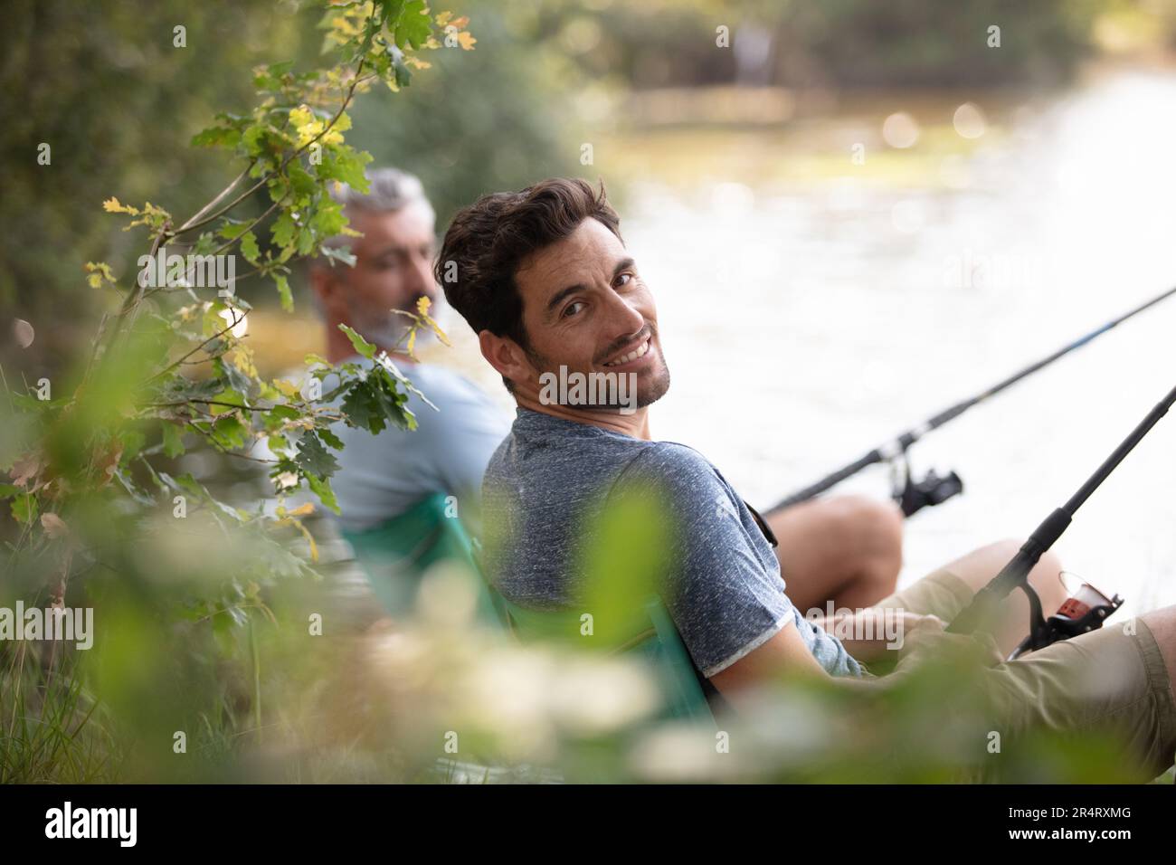 Men fishing from pier hi-res stock photography and images - Alamy